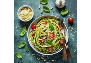 Zucchini Noodles with Pesto and Cherry Tomatoes – healthyeatingguru.com